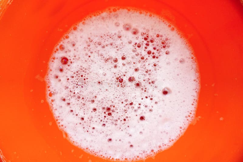 Detergent Water in the Orange Container Close Up View Stock Image ...