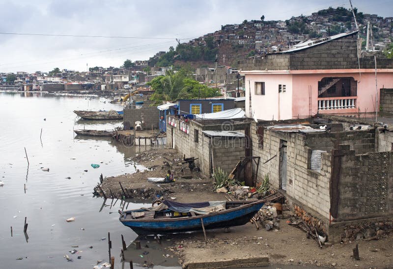 Deteriorated Houses by River, Haiti Stock Image - Image of garbage ...
