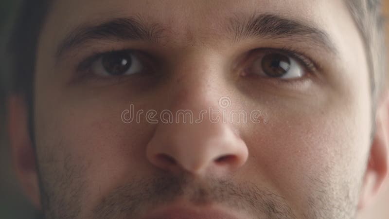 Determination in Eyes. Half Male Face Close-up. Human Eye Looking at ...
