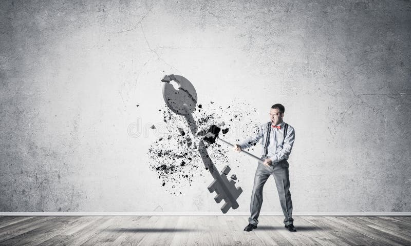Breaking through Access Concept with Man in Room Crashing Concrete Key ...
