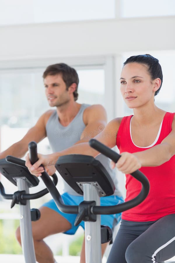 Determined Couple Working Out at Spinning Class in Gym Stock Image ...
