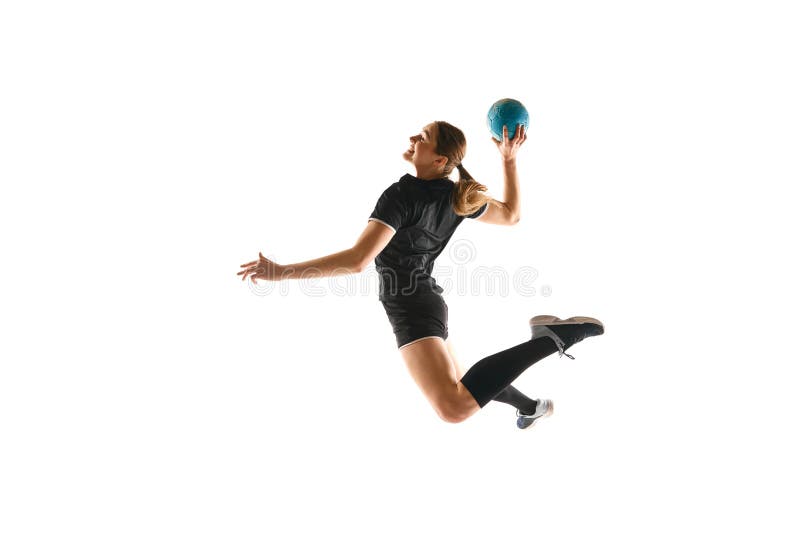 Determined Female Athlete Practicing Handball Moves with Concentration ...