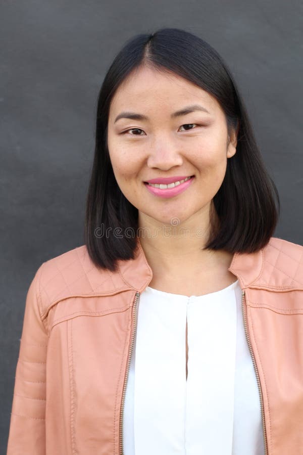 Determined Looking Asian Working Woman Smiling with Copy Space Stock ...