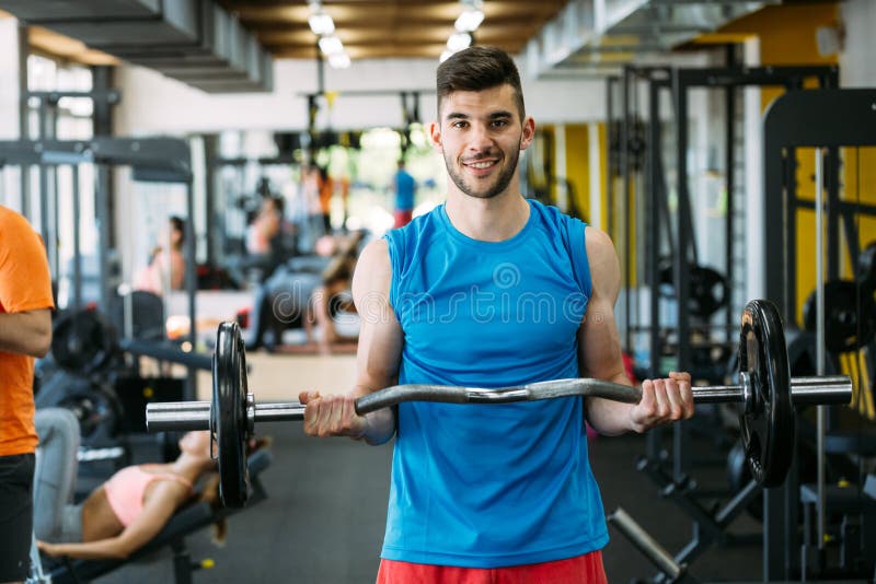 Determined Male Exercising in Gym Stock Image - Image of active ...