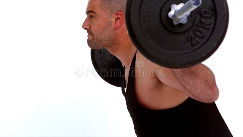 Determined Man Lifting Heavy Barbell Stock Video - Video of definition ...