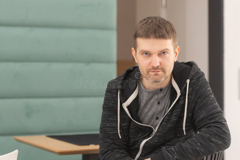 Determined man stock image. Image of attractive, shirt - 156520195