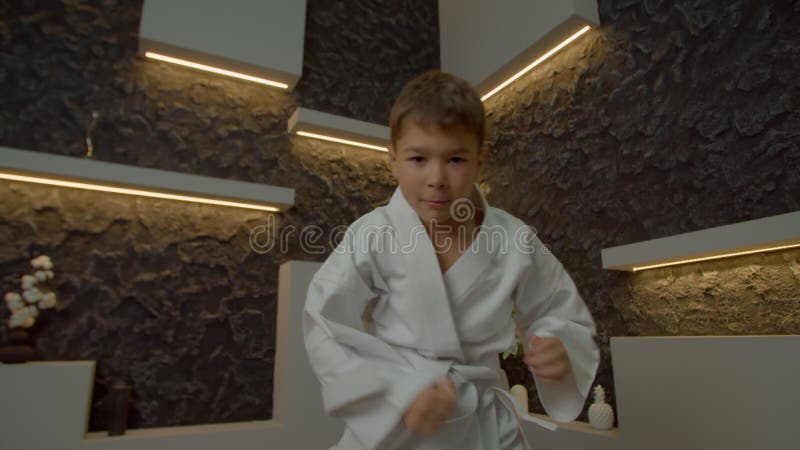 Determined Multiracial Karate Kid Training Karate Punching Techniques ...