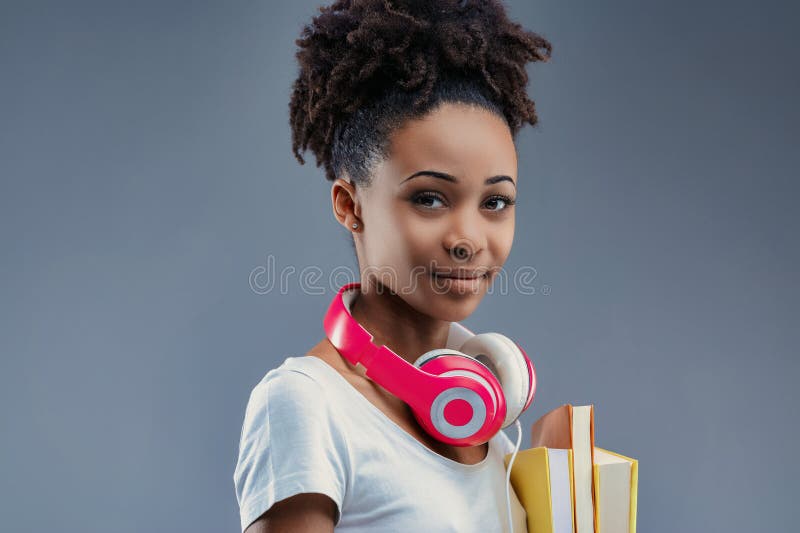 Determined Student Holds Books and Yellow Binder Stock Image - Image of ...