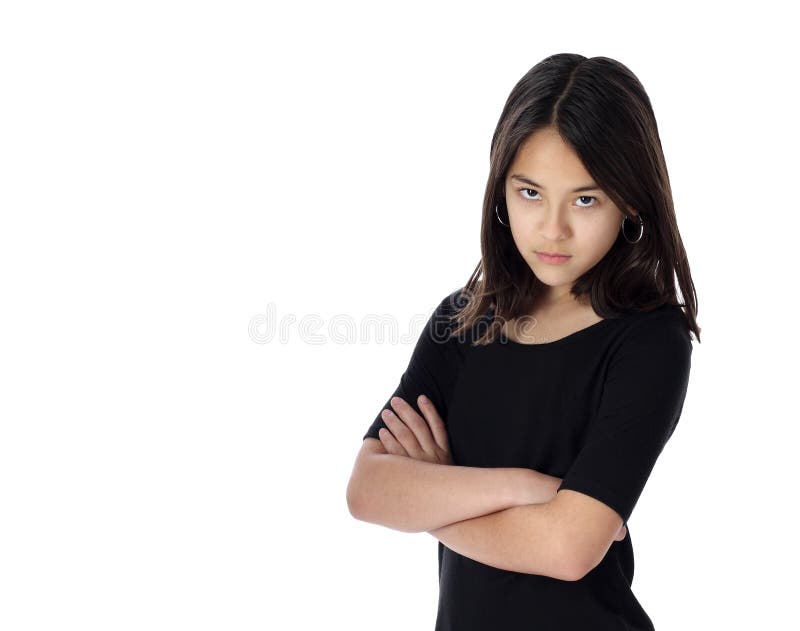A Determined Young Girl Glares Stock Photo - Image of arms, terse: 23880126