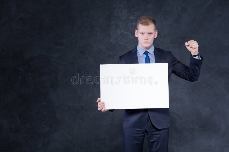 Determined young man stock image. Image of blue, businessman - 83277699