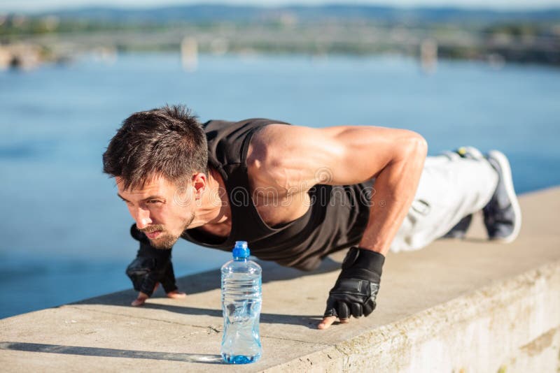 Determined Young Man Doing Push-ups. Front View Stock Image - Image of ...