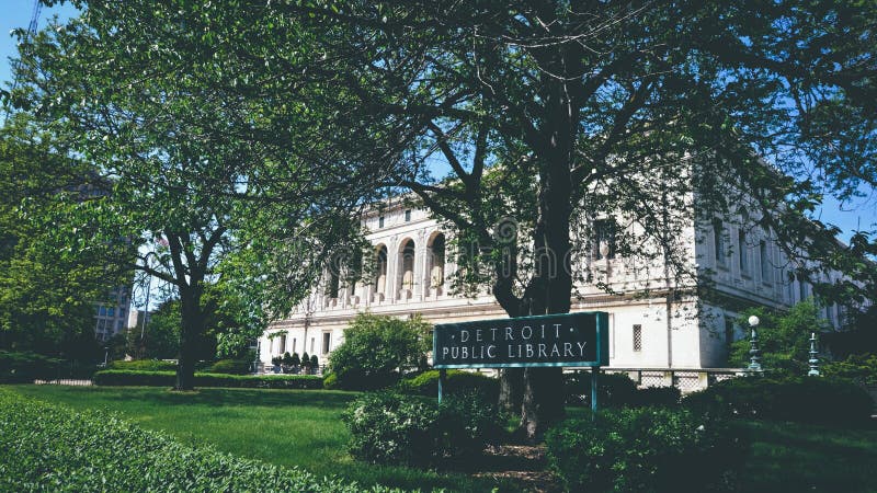 Detroit Public Library in a Park Surrounded by Greenery Under a Blue ...