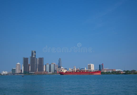 Detroit Skyline and a Red Freighter on the Detroit River Stock Photo ...