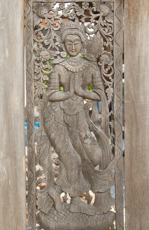 Deva statue wood carving stock photo. Image of worship - 53112966