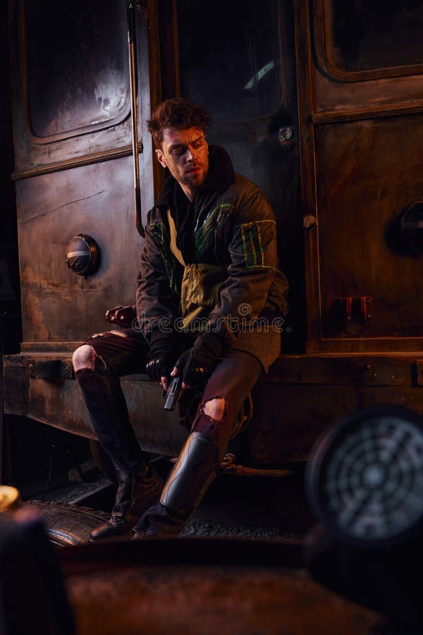 Devastated Man in Worn Clothes Sitting Stock Photo - Image of ...