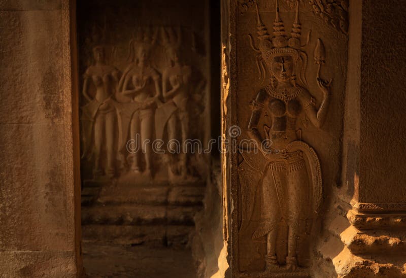 Devata Statues in Angkor Wat Stock Photo - Image of apsara, golden ...