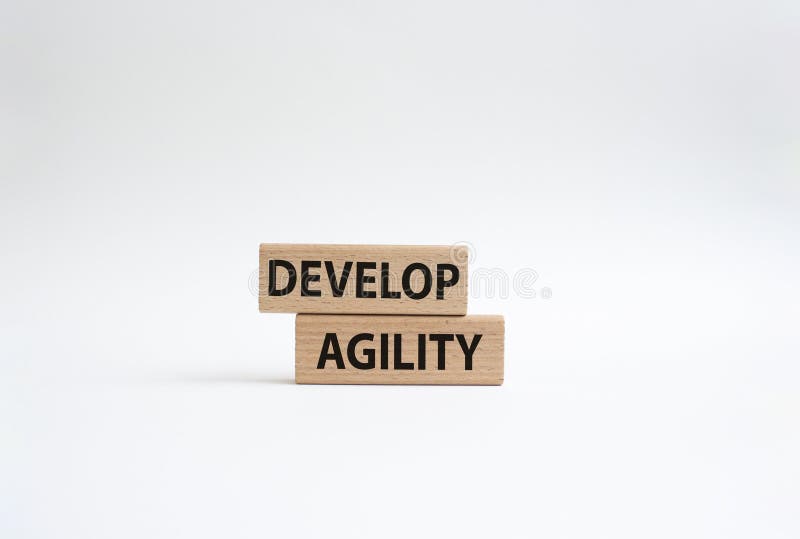 AGILITY - Word Written on Wooden Blocks on Wooden Table. Concept for ...