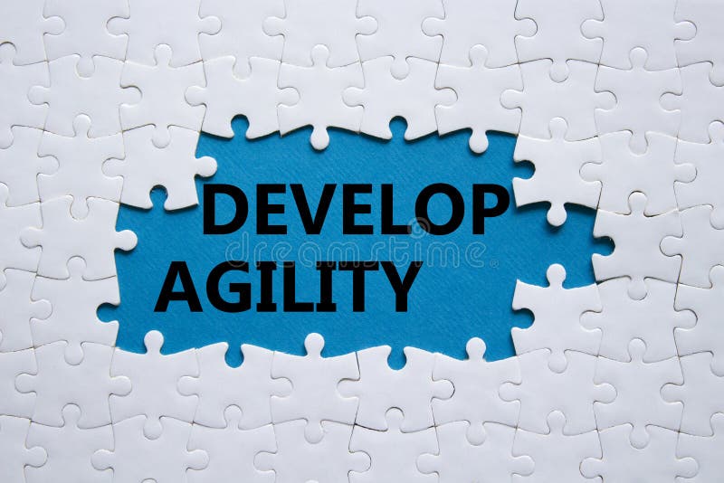 Develop Agility Symbol. Concept Word Develop Agility on White Puzzle ...