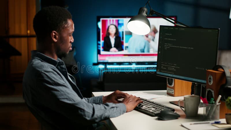 Developer Enters Binary Data on Terminal Panel while he Establishes Html Code Stock Footage ...
