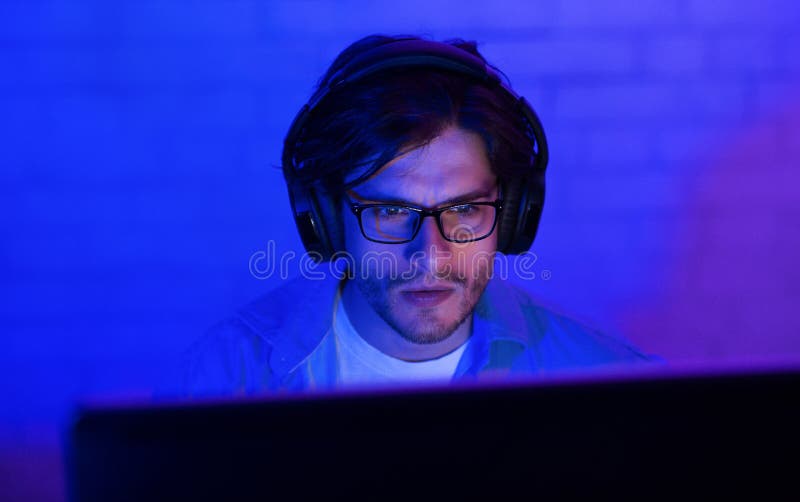 Developer in Eyeglasses Working on Desktop PC Indoor at Night Stock ...