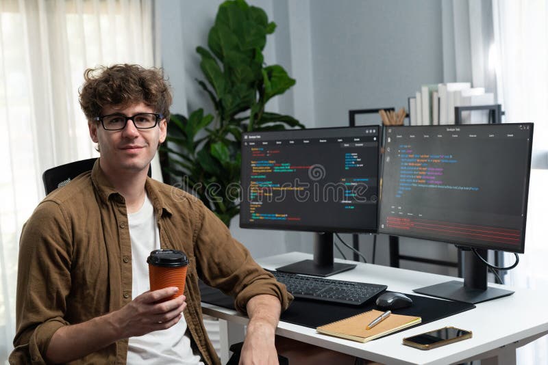 It Developer Looking at Camera and Holding Coffee Cup. Gusher. Stock ...