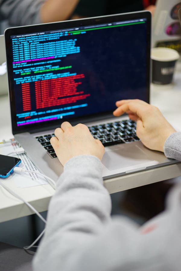 Laptop Screen With Lines Of Code Programmer Writes An Application In The Programming Language