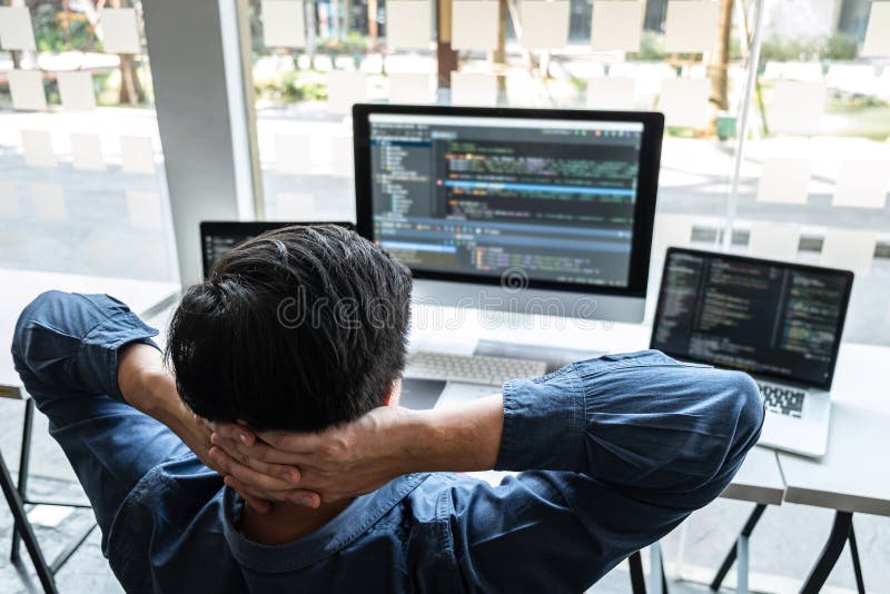 Developer Programmer Relaxing and Looking Project in Software Development Computer in it Company ...