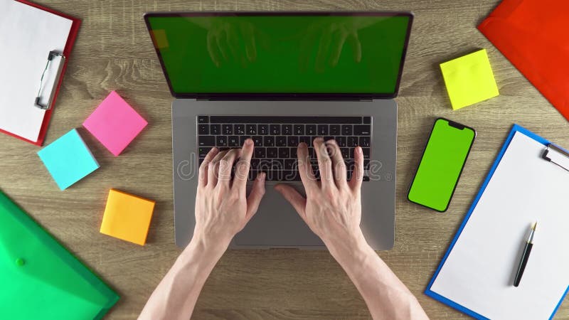 The Developer is Programming on the Laptop. Modern Workplace Stock ...