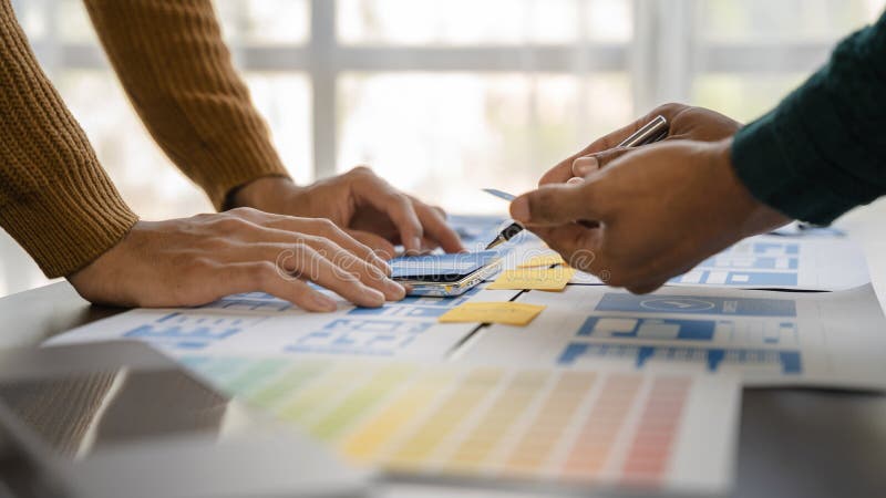 Ui Developer And Ui Designer Brainstorming About Mobile App Interface Wireframe Design With