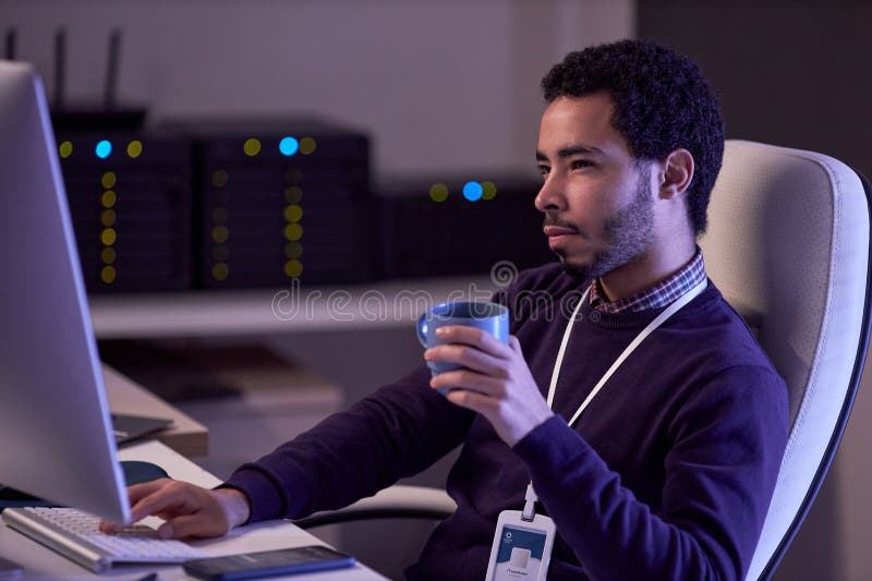 It Developer Working at Night Writat Desk in Office Stock Image - Image ...