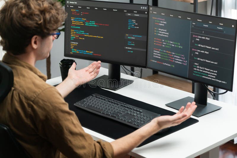 It Developer Working Online Software Development Coding on Pc Screens ... It Developer Working Online Software Development Coding on Pc Screens ...