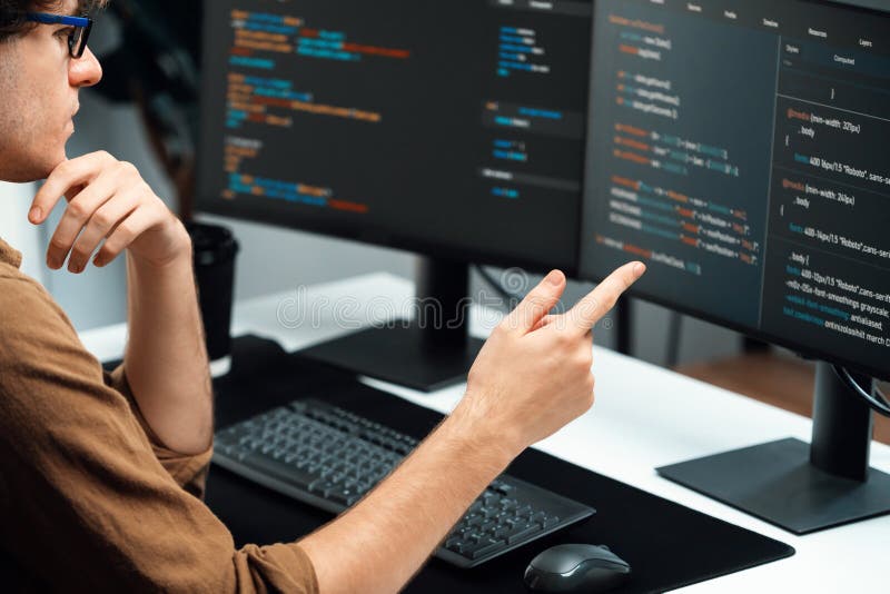 It Developer Working Online Software Development Coding on Pc Screens ... It Developer Working Online Software Development Coding on Pc Screens ...