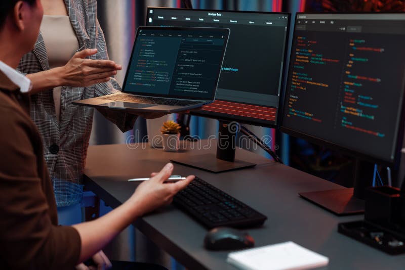 It Developers Discussing Intelligent Website with Laptop Showing Data. Infobahn. Stock Image ...