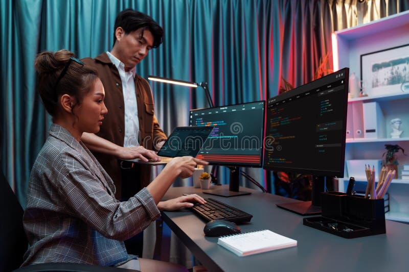 It Developers Discussing Intelligent Website with Laptop Showing Data ...