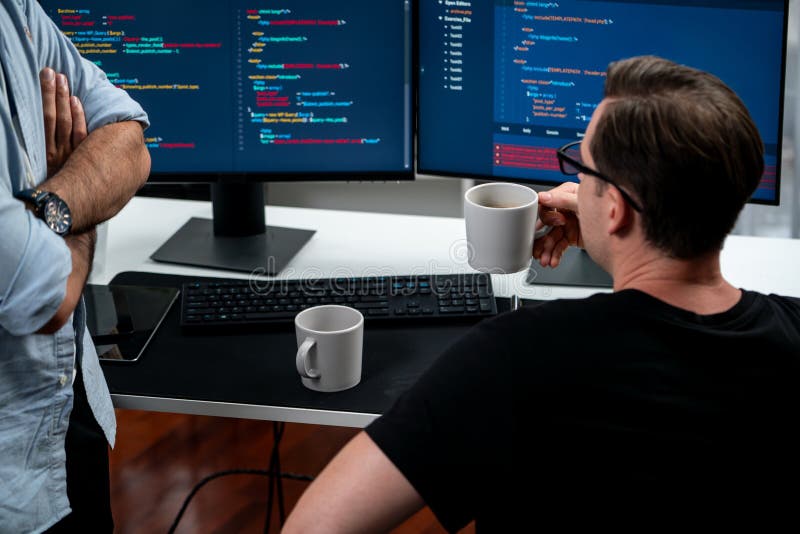 It Developers Discussing Online Software Development Information