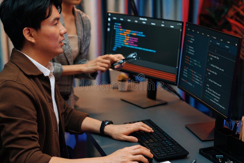 It Developers Discussing with Point Website Coding System. Infobahn. Stock Image - Image of ...