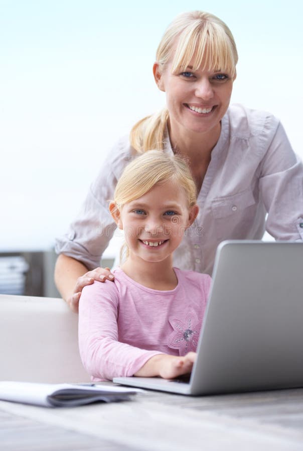 Developing Her Computer Skills. a Mother Teaching Her Daughter How To ...