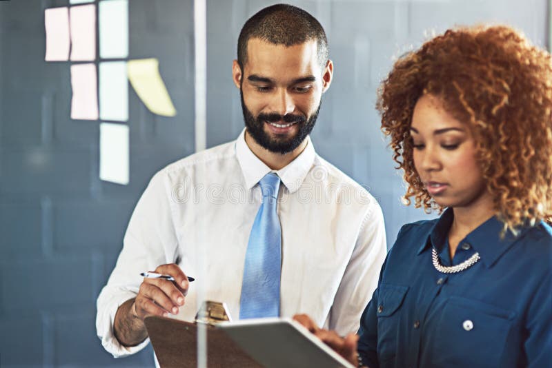 Developing New Strategies As a Team. Two Young Professionals ...