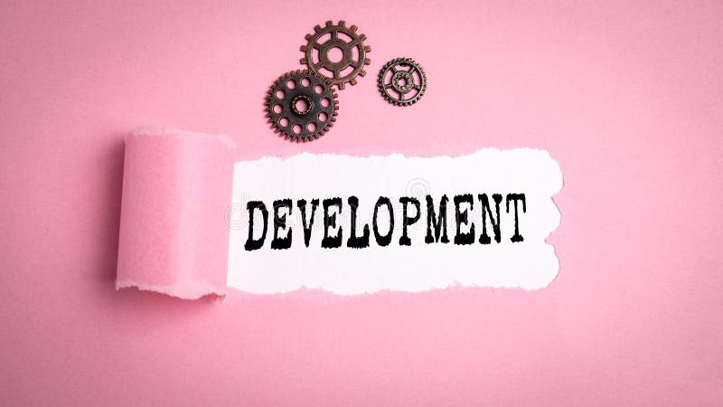 DEVELOPMENT, Business Concept. Text Under Torn Paper Stock Photo ...