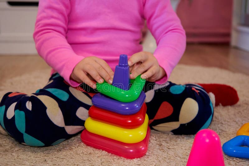 Child is Playing a Toy Pyramid,development of Children To Think ...