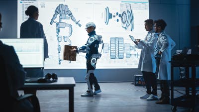 In Development Laboratory: Engineers Look at Robotics Exoskeleton ...