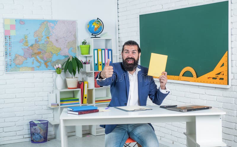 Development. Learning the Subject. Happy Man with Beard Look at ...