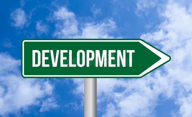 Development Road Sign on Cloudy Sky Background Stock Image - Image of ...
