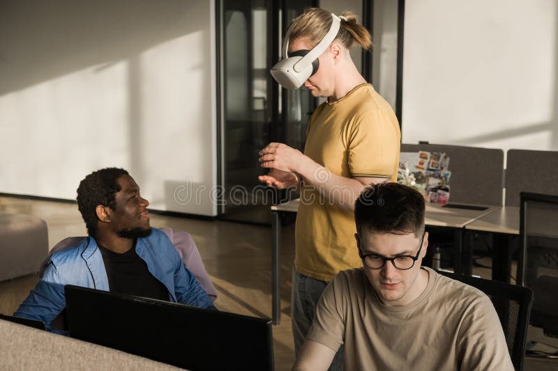 It Development Team Working on VR Project. Man Wearing VR Headset ...