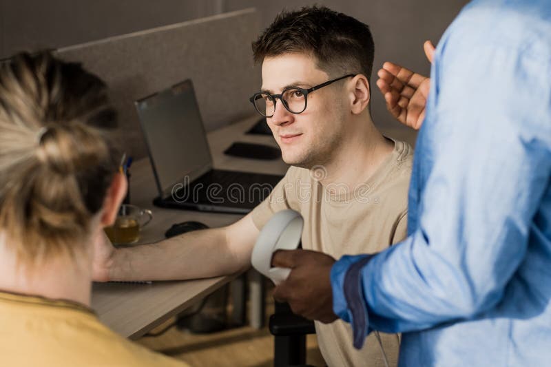 It Development Team Working on VR Project. Man Wearing VR Headset ...