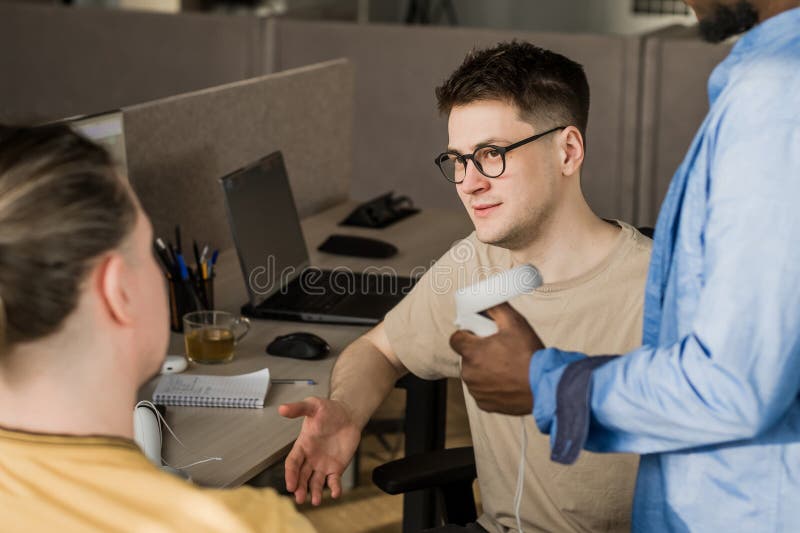 It Development Team Working on VR Project. Man Wearing VR Headset ...