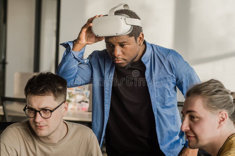It Development Team Working on VR Project. Man Wearing VR Headset ...