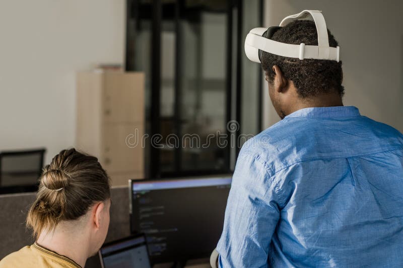 It Development Team Working on VR Project. Man Wearing VR Headset ...