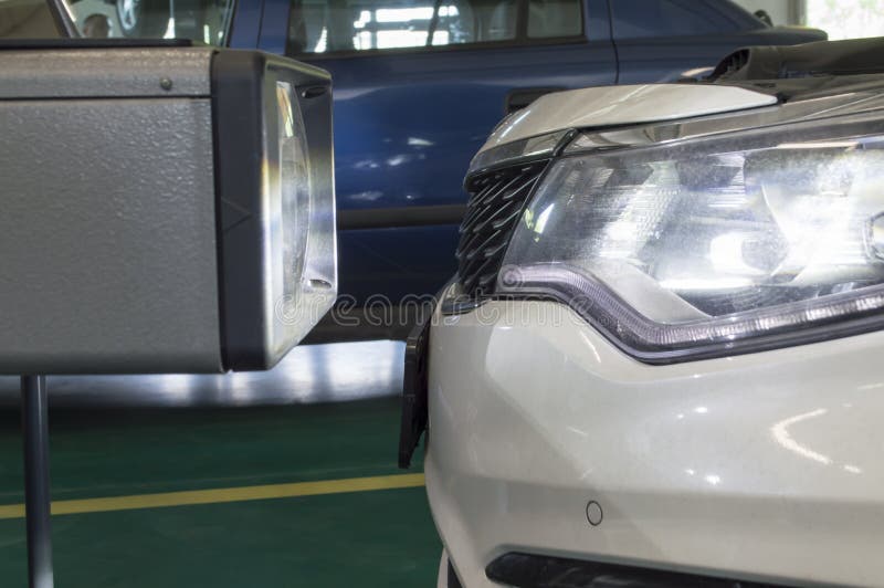 The Device for Adjusting the Light of the Headlights Stands in Front of ...