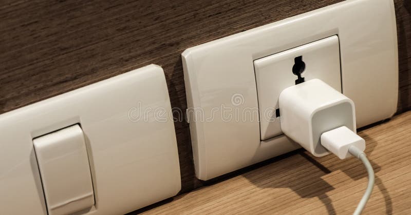 Device Charging on Power Socket Stock Photo - Image of plug, electric ...